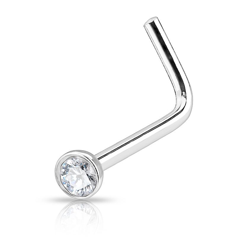 Mooie kleine neuspiercing van titanium met steentje